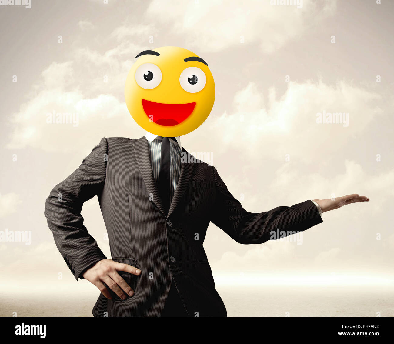 businessman wears yellow smiley face Stock Photo - Alamy