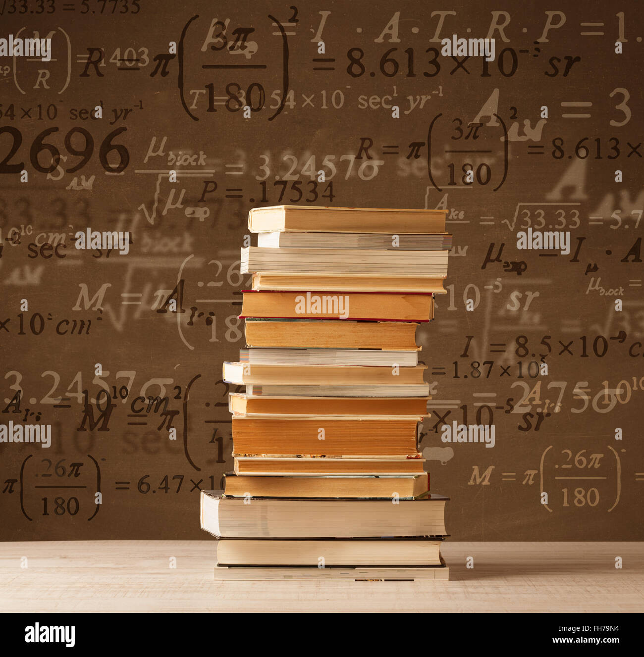 Books on vintage background with math formulas Stock Photo - Alamy