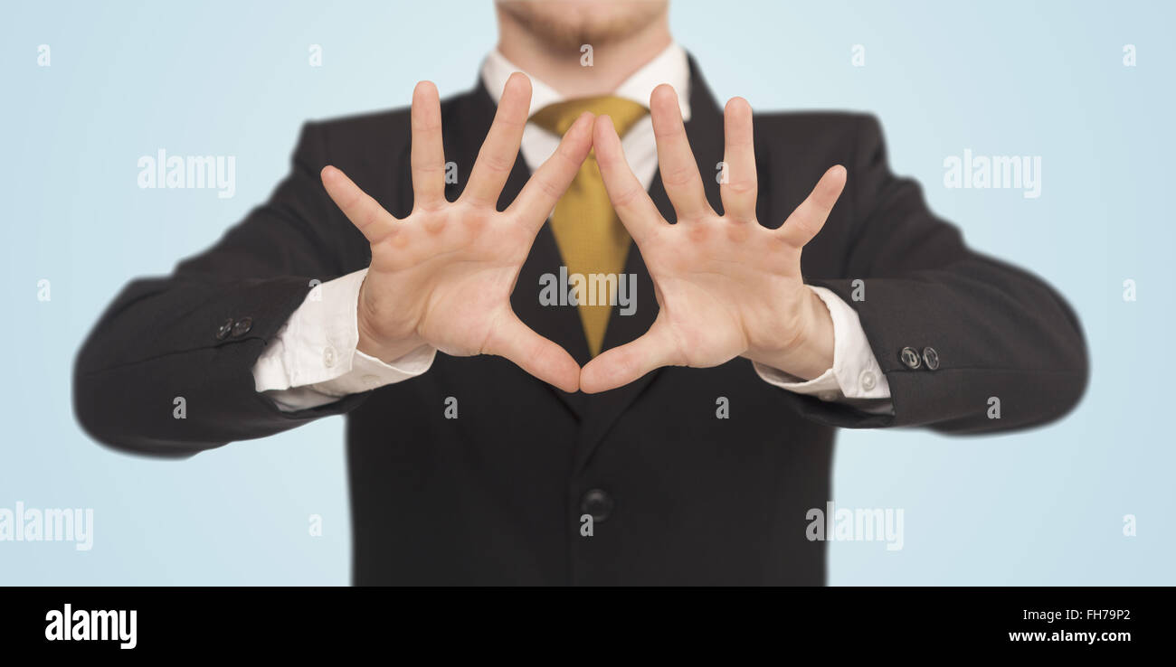 Hands creating form Stock Photo - Alamy