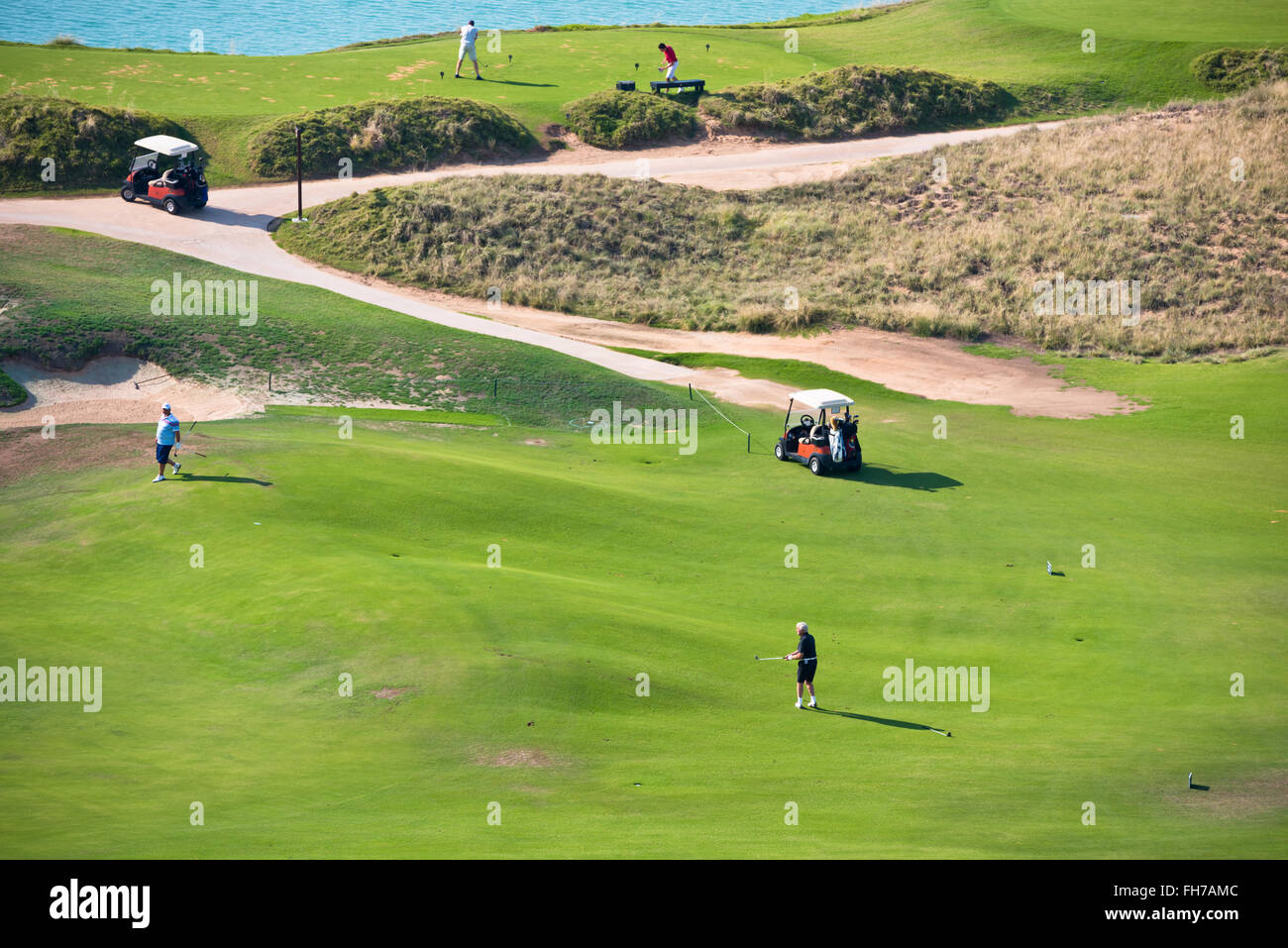 View of green golf resort field. summer vacations Stock Photo - Alamy