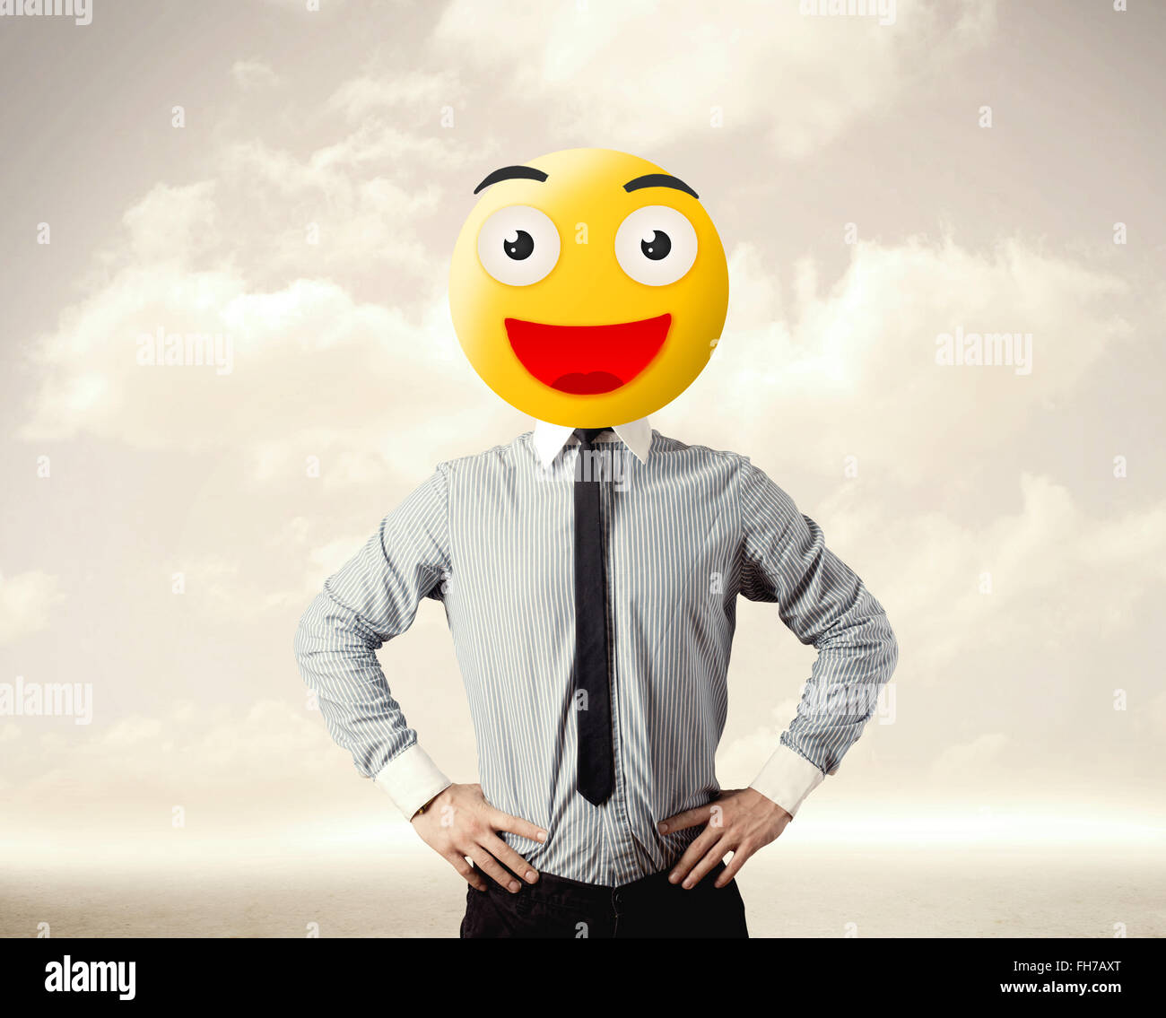 businessman wears yellow smiley face Stock Photo - Alamy