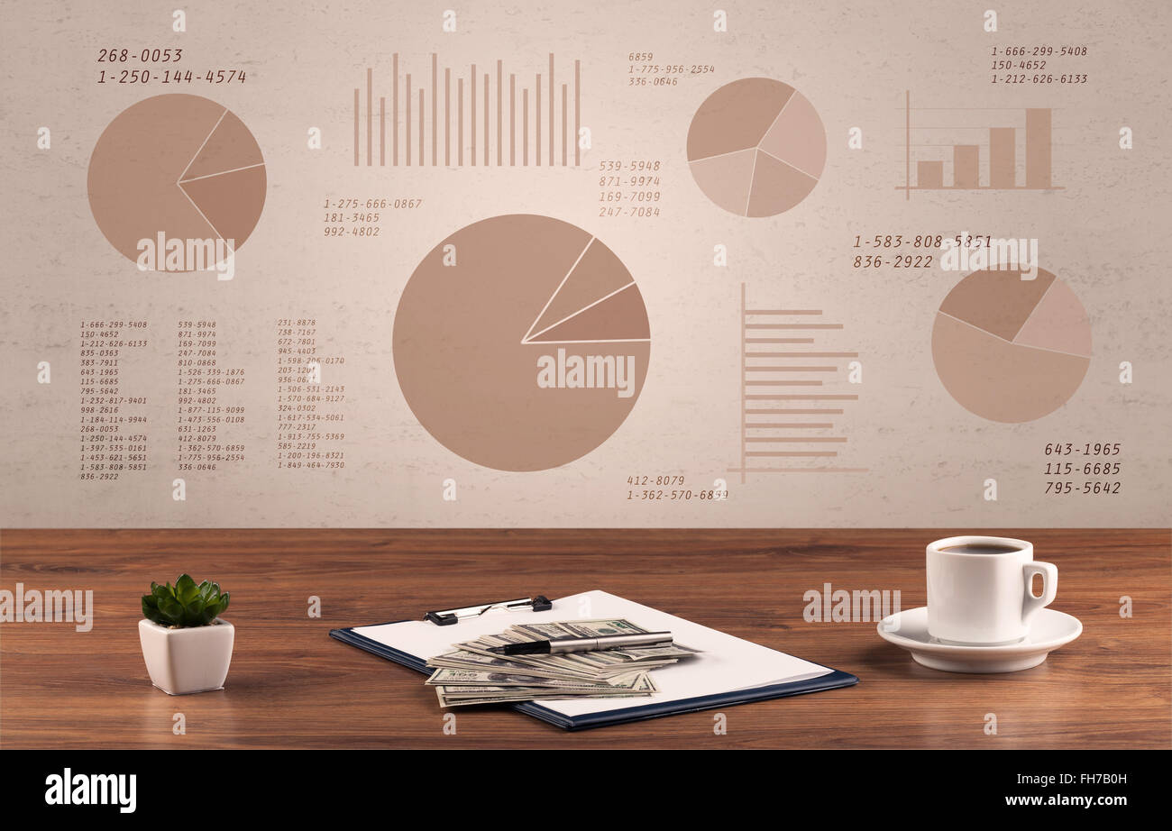 Pie chart graph office desk Stock Photo - Alamy