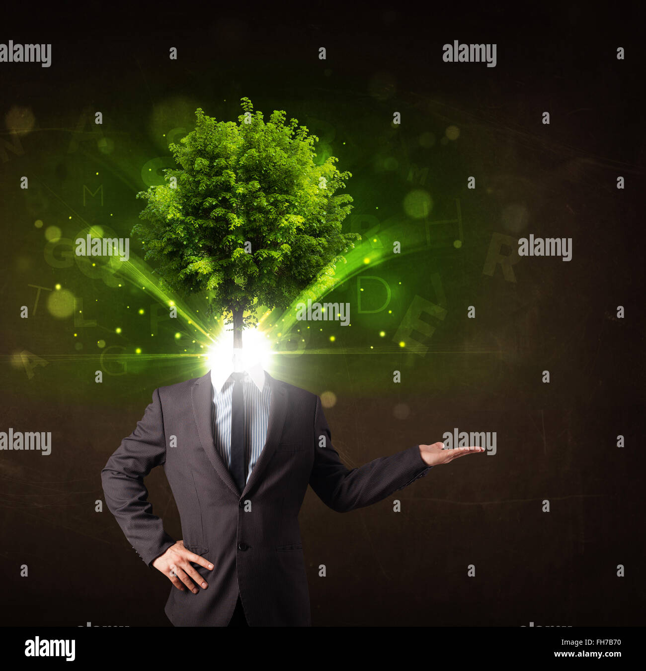 Man with green tree head concept Stock Photo - Alamy