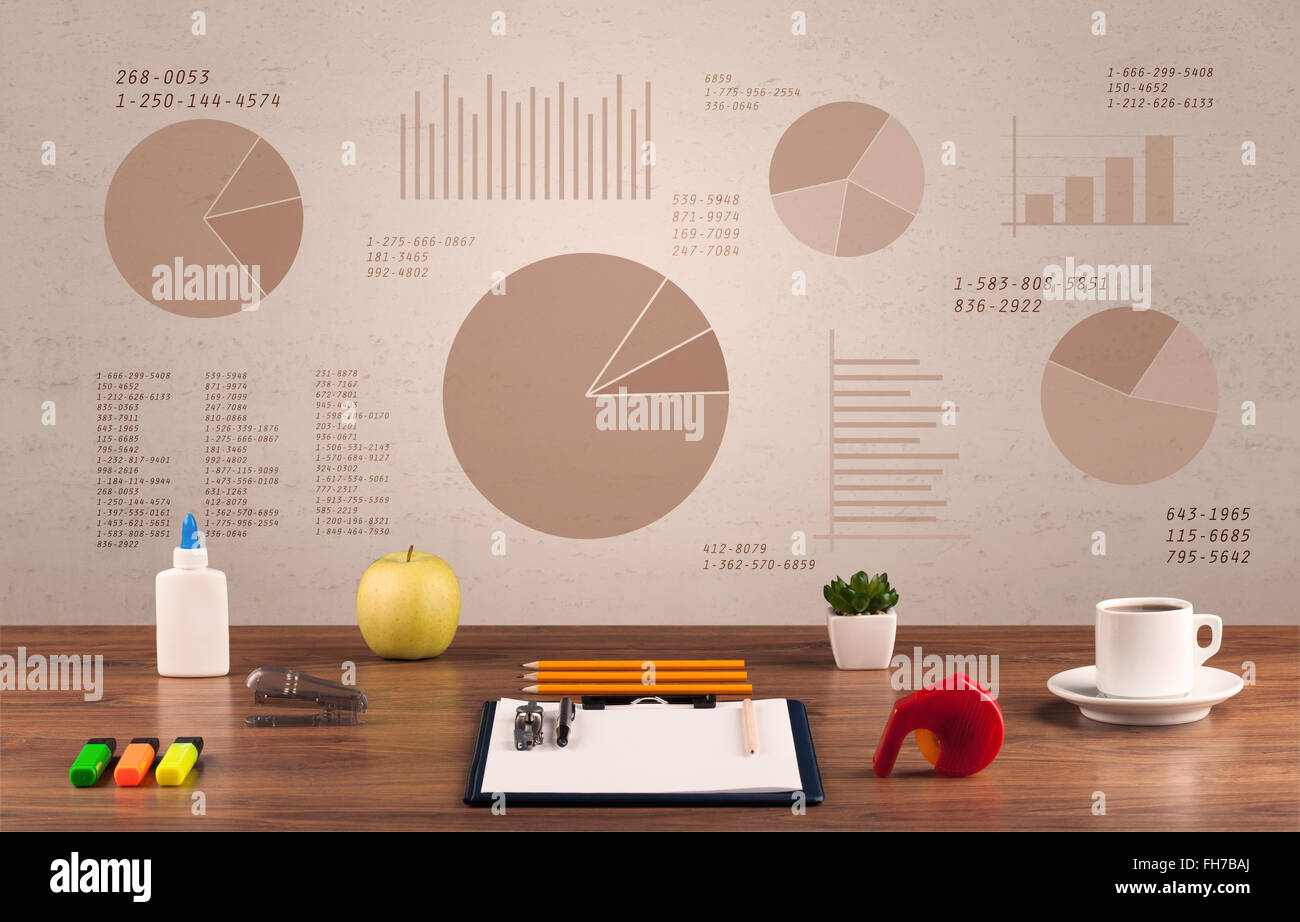 Pie chart graph office desk Stock Photo - Alamy