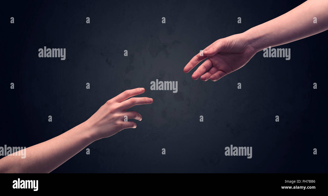 Hands reaching for one another hi-res stock photography and images - Alamy