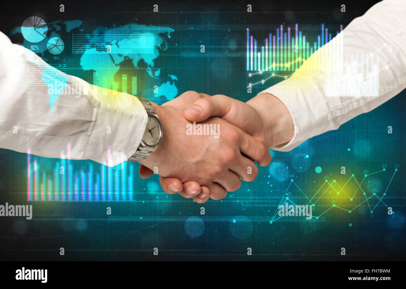 Handshake with diagrams Stock Photo - Alamy