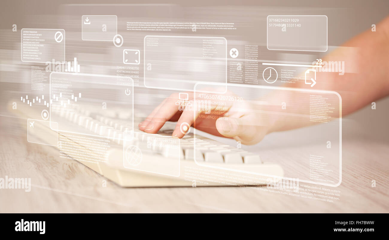 Hand touching keyboard with high tech buttons Stock Photo - Alamy