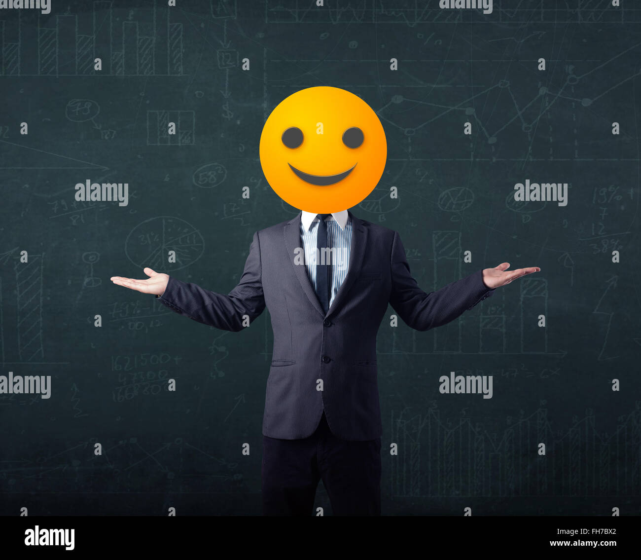 businessman wears yellow smiley face Stock Photo - Alamy