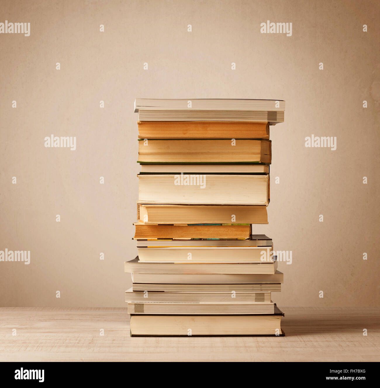 A stack of books with vintage background Stock Photo - Alamy