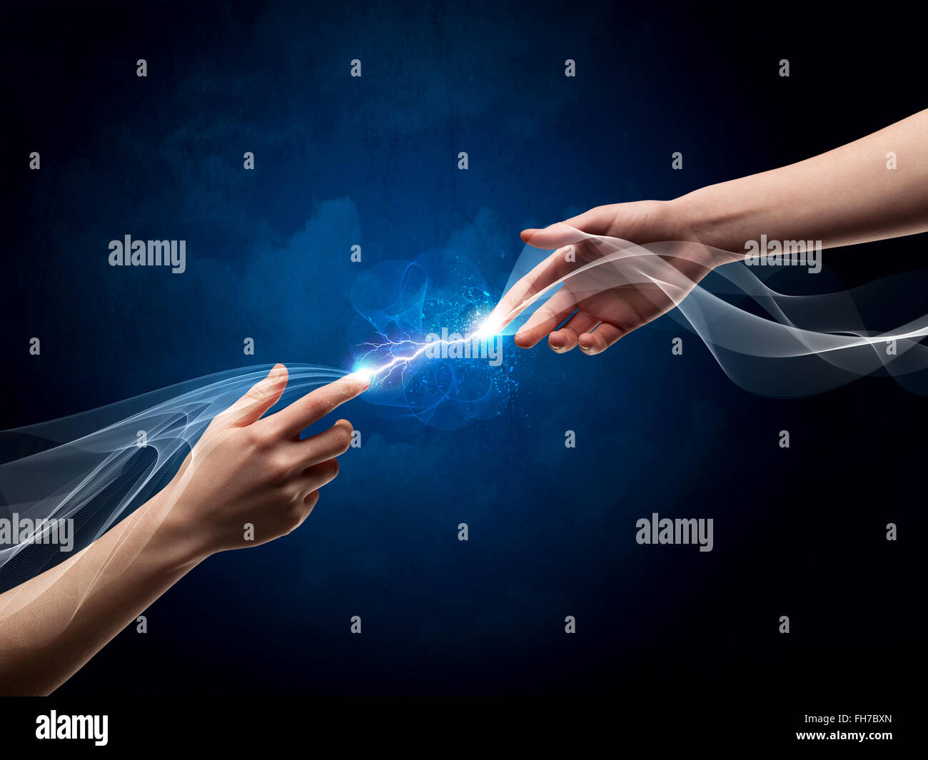 Hands connecting through fingers in space Stock Photo - Alamy