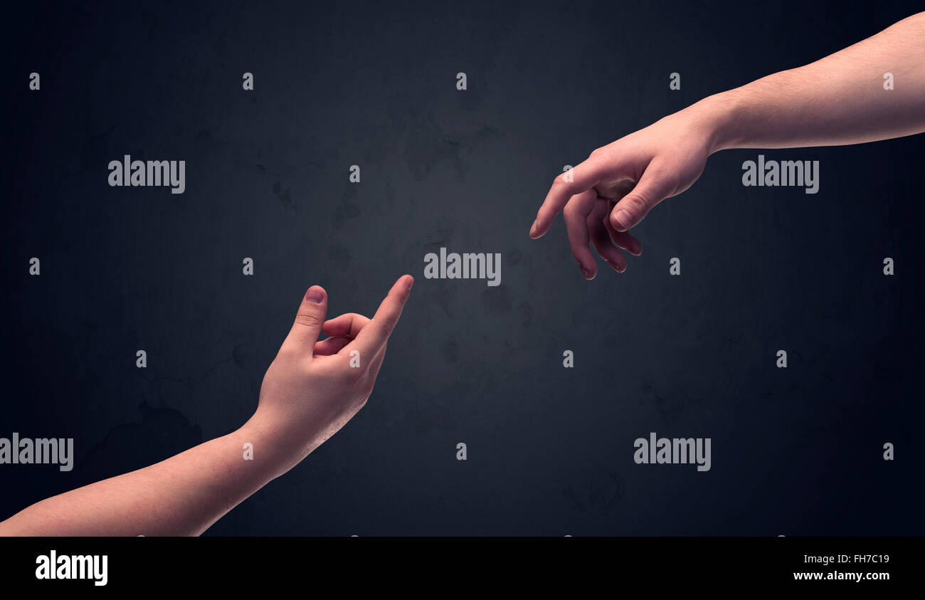 Hand about to touch another one Stock Photo - Alamy