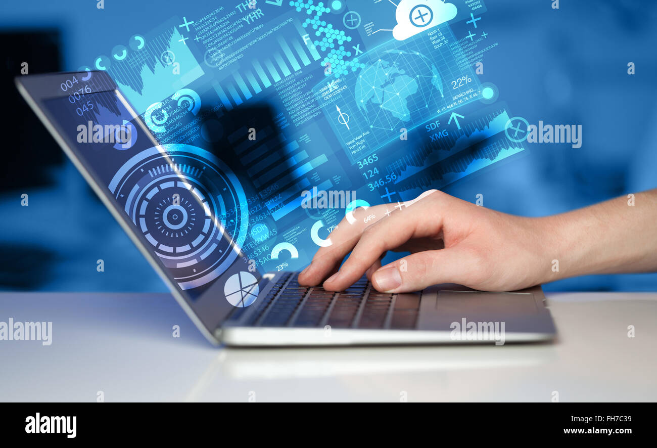 Modern notebook computer with future technology symbols Stock Photo - Alamy