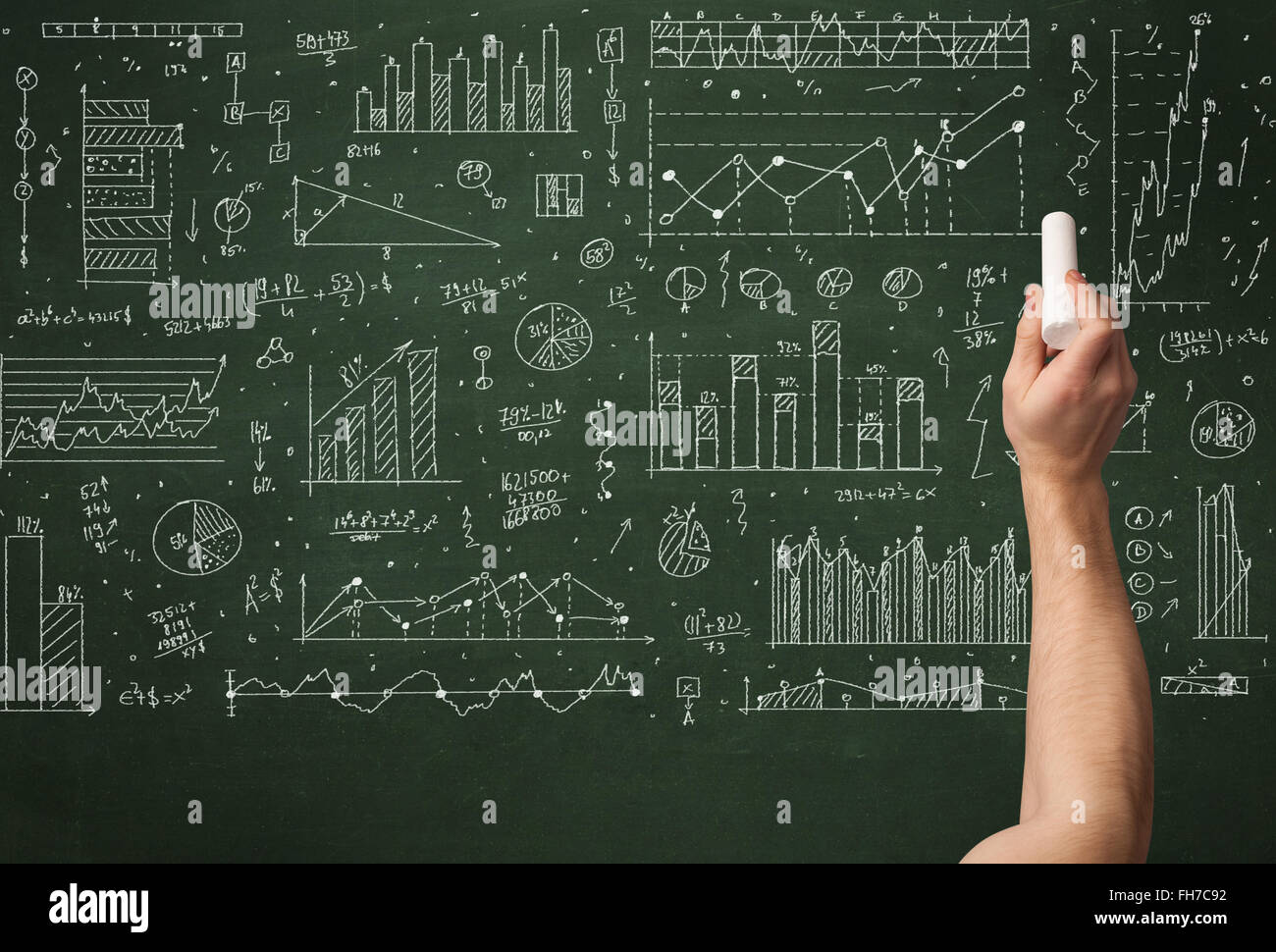 A business person drawing data on chalkboard Stock Photo - Alamy