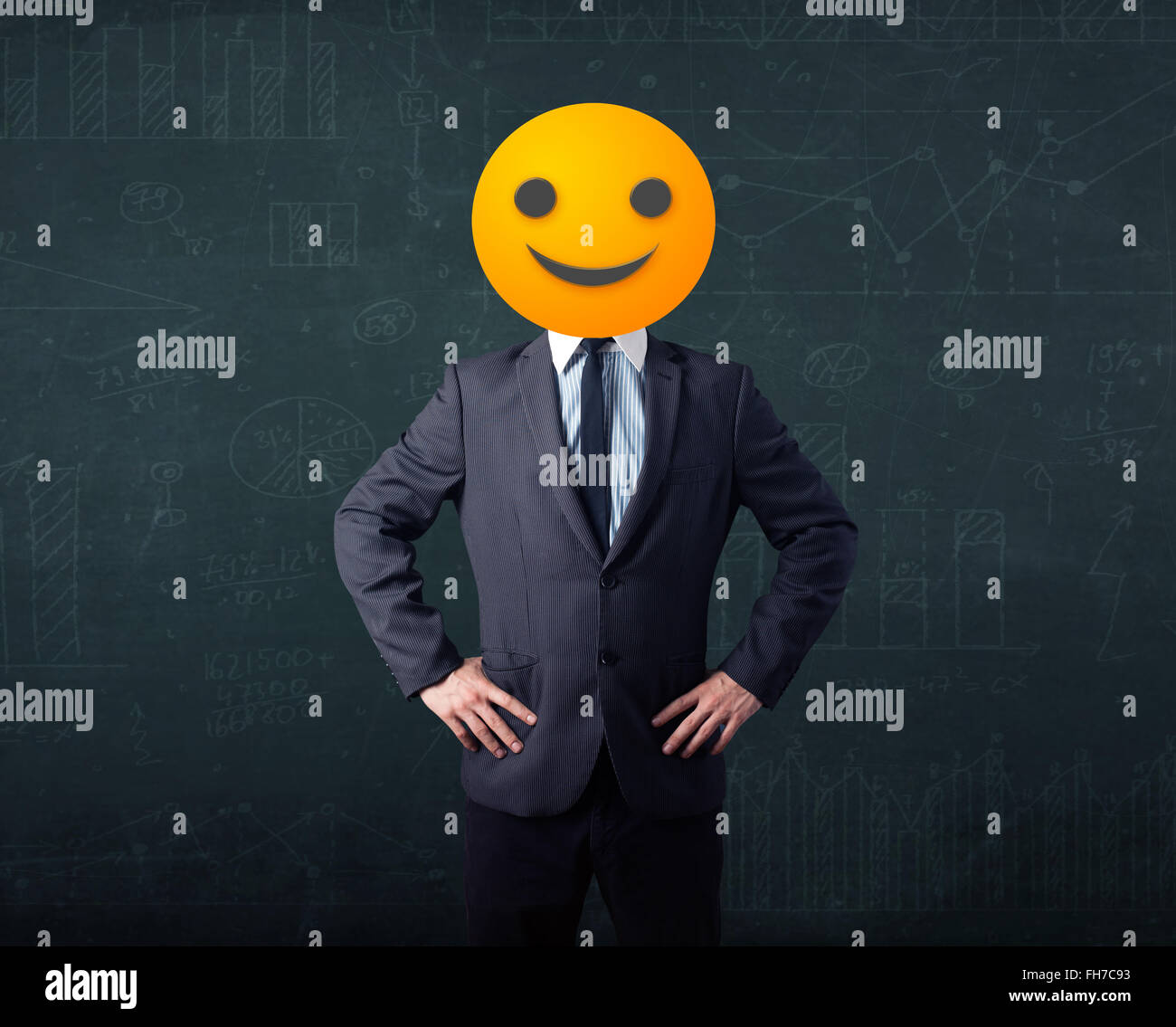 businessman wears yellow smiley face Stock Photo - Alamy