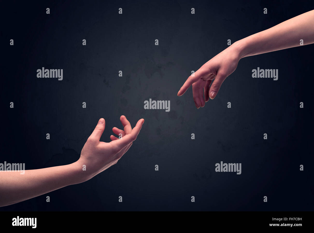 Hands reaching for one another hi-res stock photography and images - Alamy
