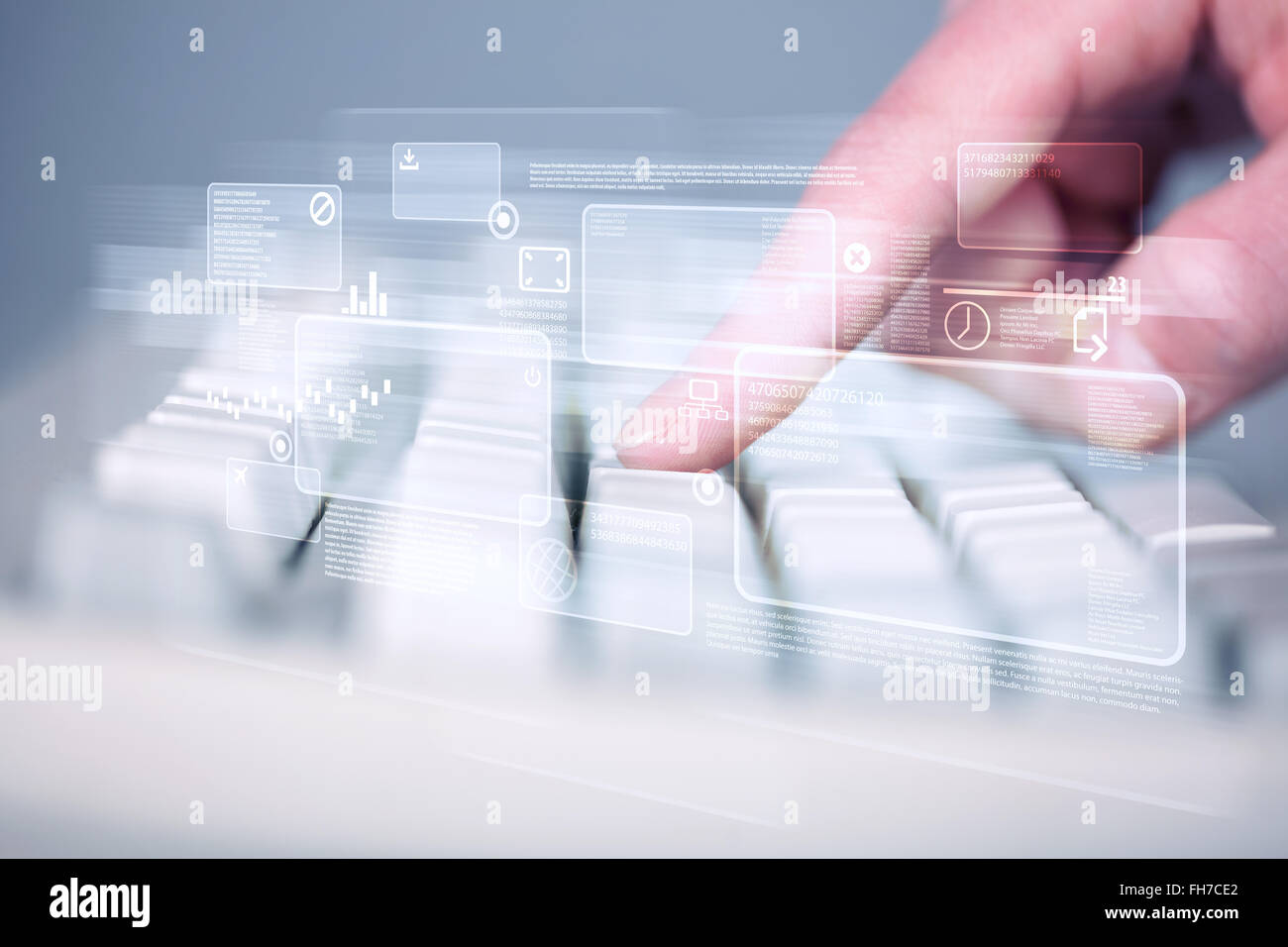 Hand touching keyboard with high tech buttons Stock Photo - Alamy