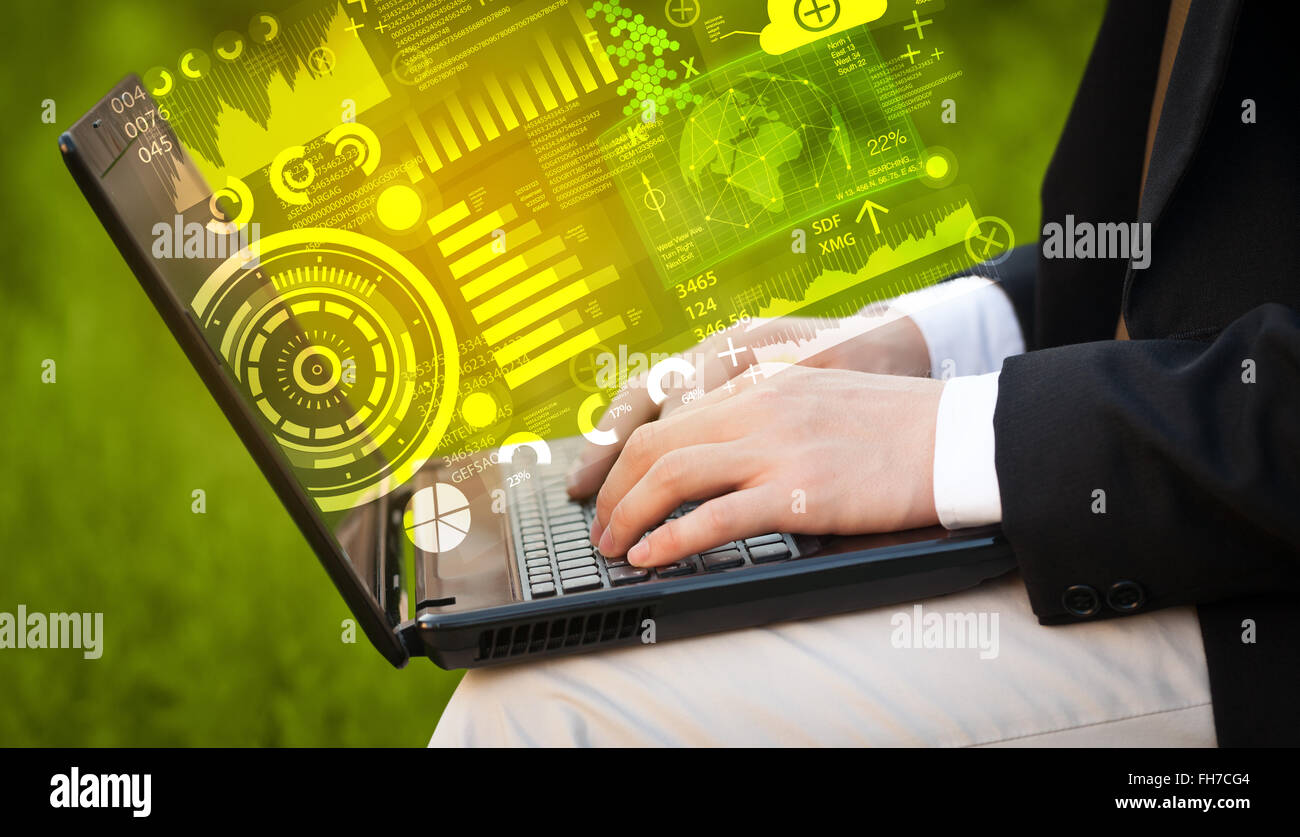 Modern notebook computer with future technology symbols Stock Photo - Alamy