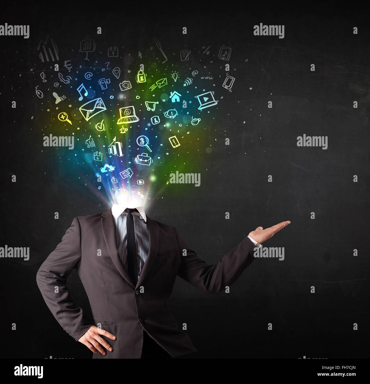 Business man with glowing media icons exploding head Stock Photo - Alamy