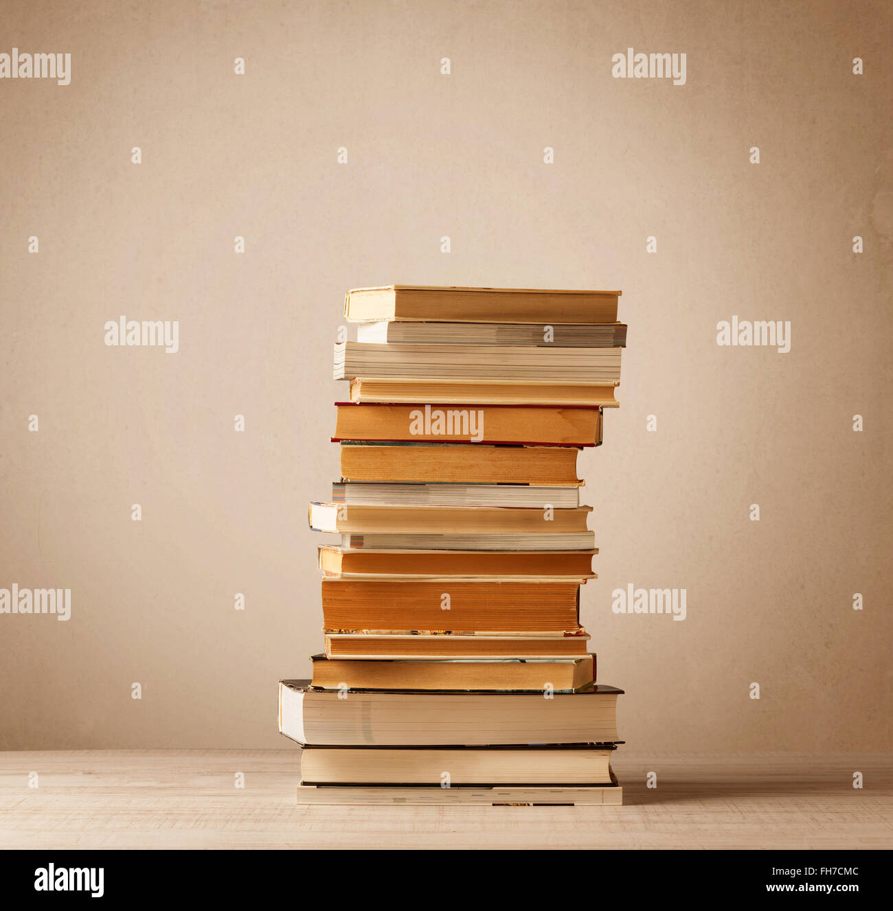 A stack of books with vintage background Stock Photo - Alamy