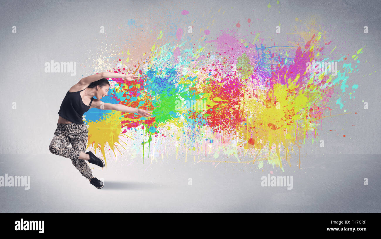 Young colorful street dancer with paint splash Stock Photo - Alamy