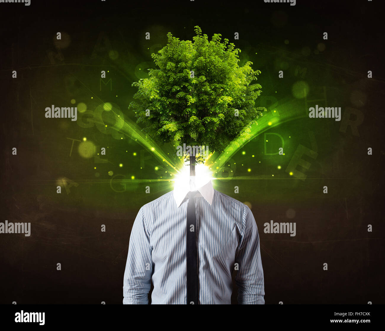 Man with green tree head concept Stock Photo - Alamy