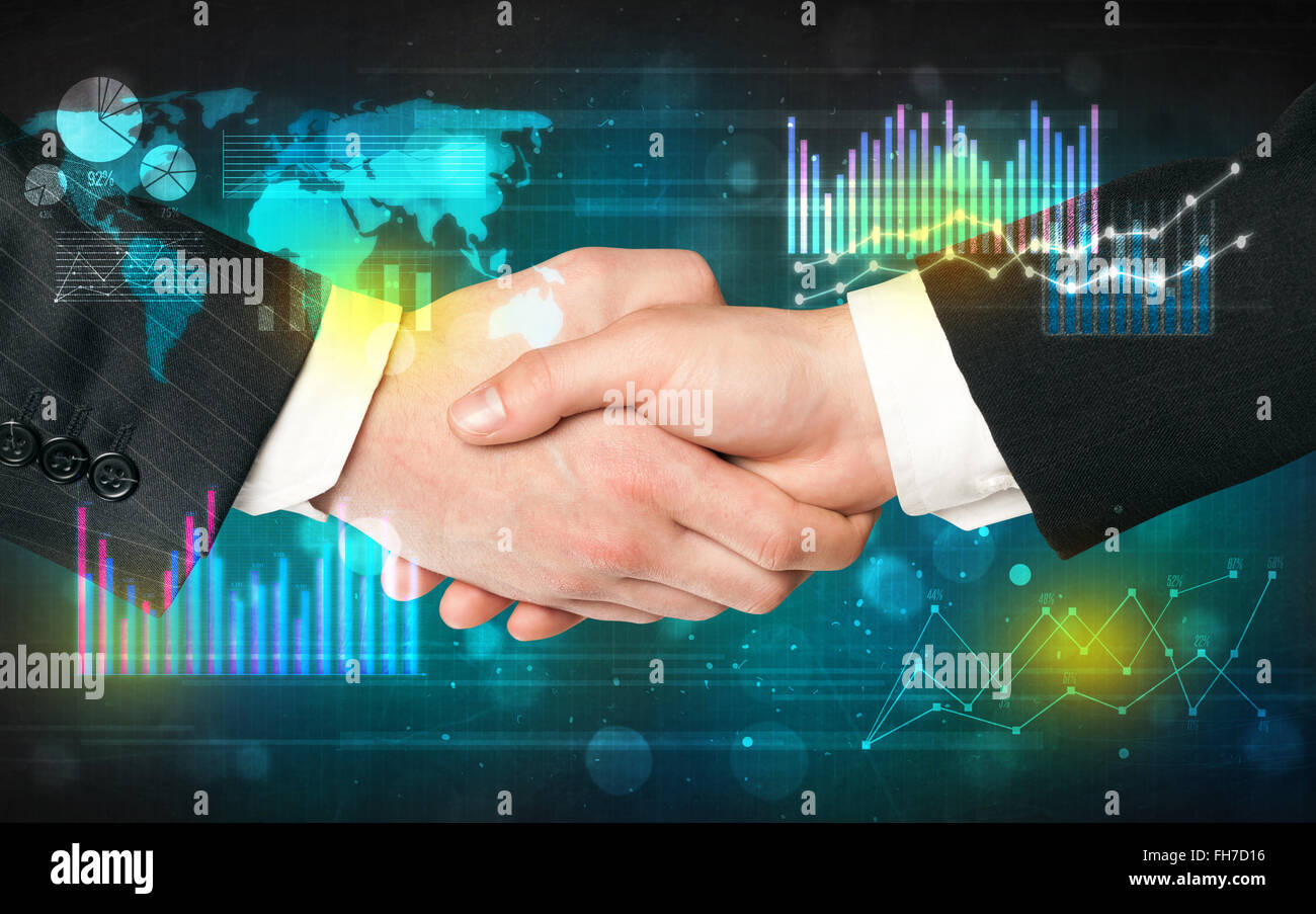 Handshake with diagrams Stock Photo - Alamy