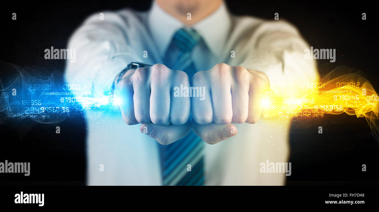 Man holding colorful glowing data in his hands Stock Photo - Alamy