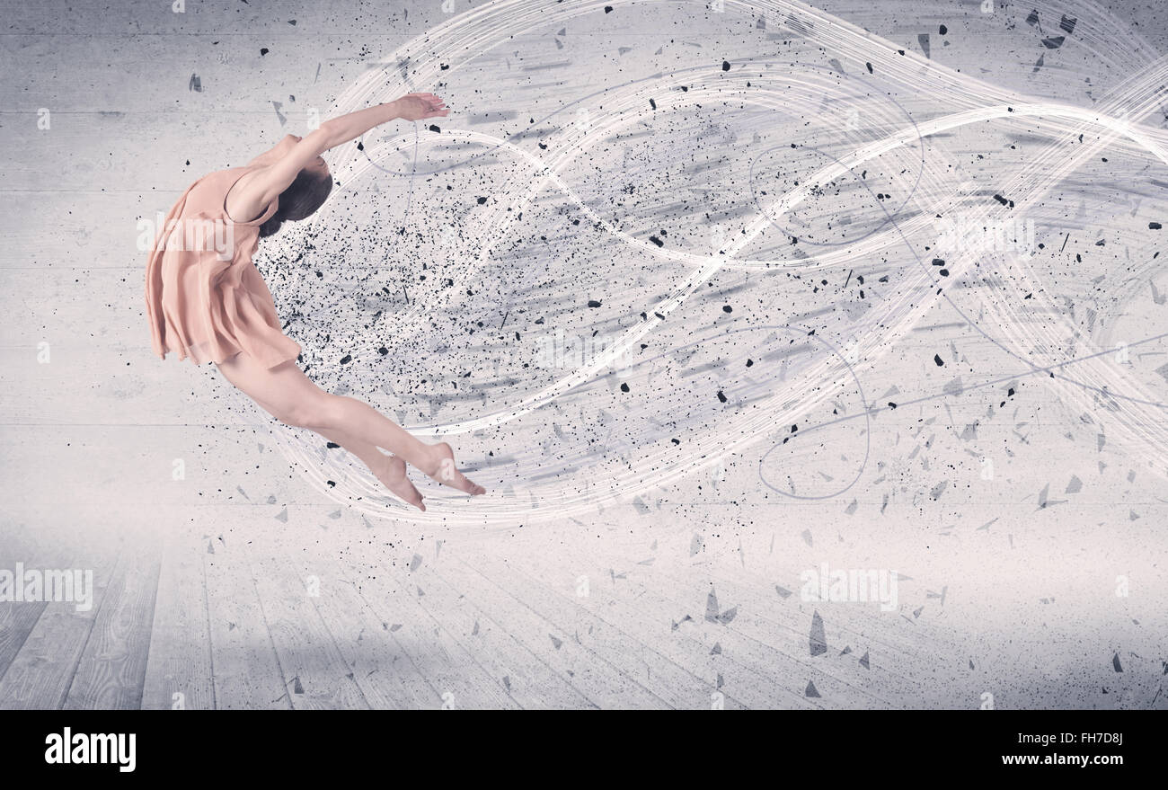 Performance ballet dancer jumping with energy explosion particles Stock ...