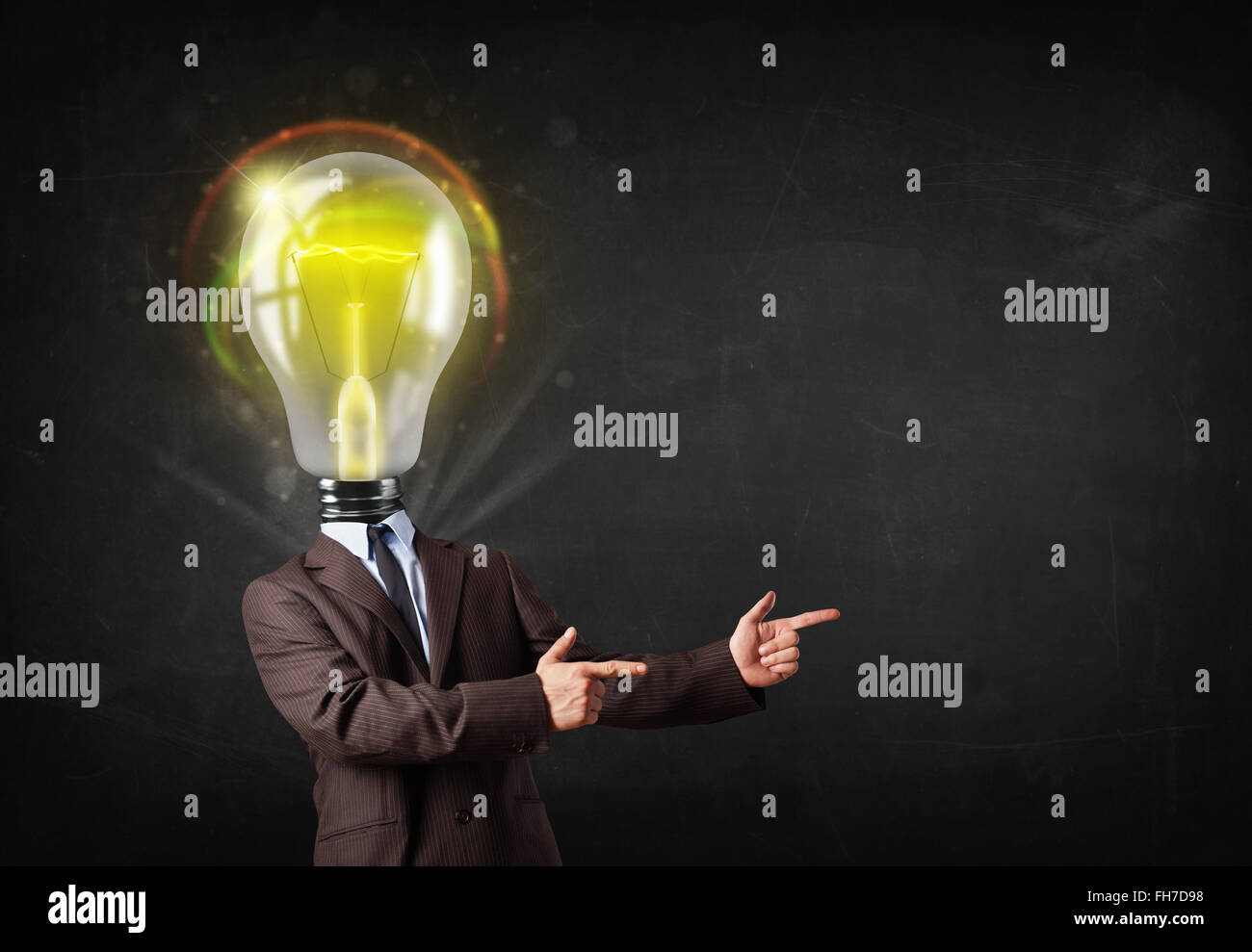 Business man with light bulb head concept Stock Photo - Alamy