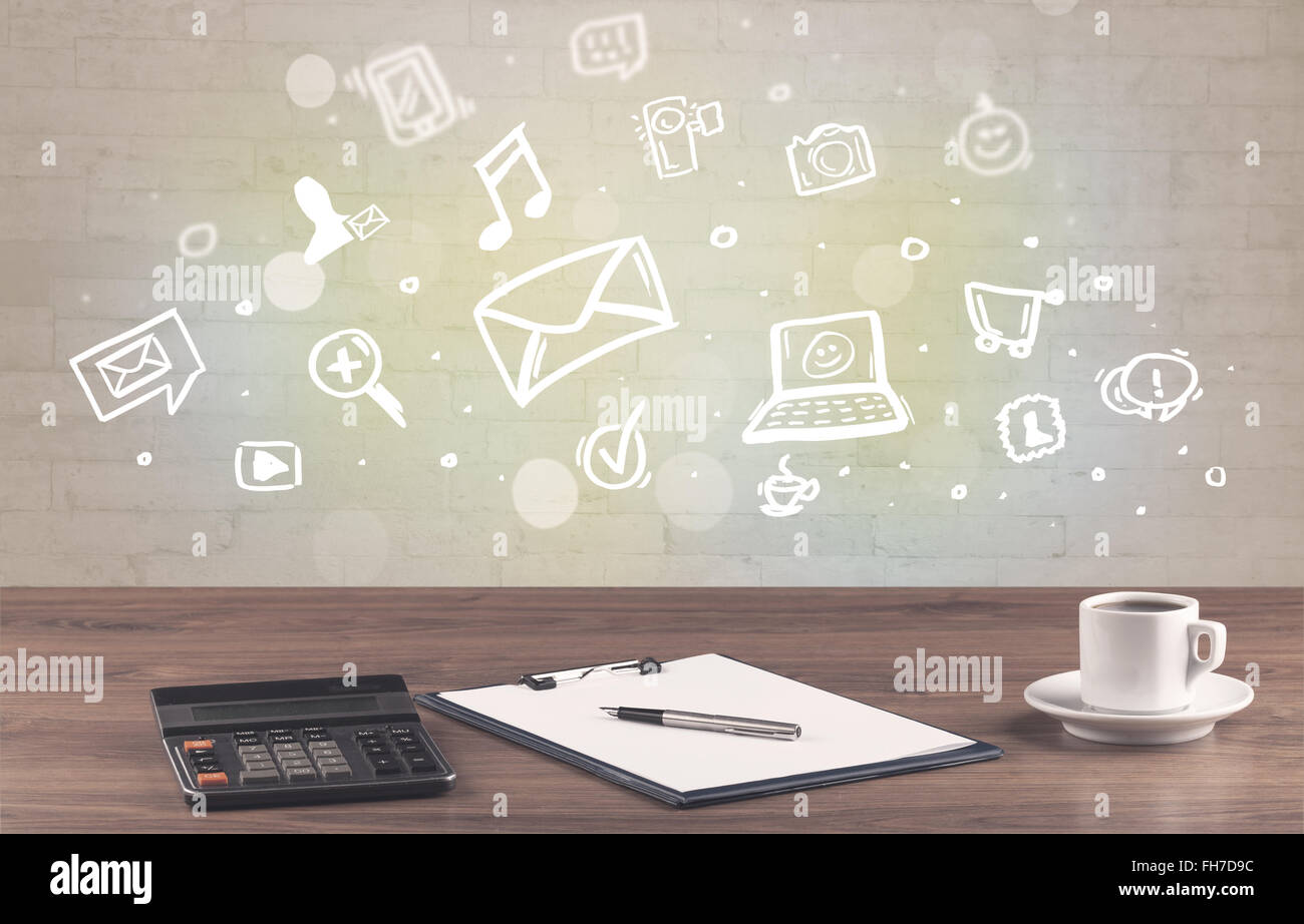 Office desk with communication icons Stock Photo - Alamy
