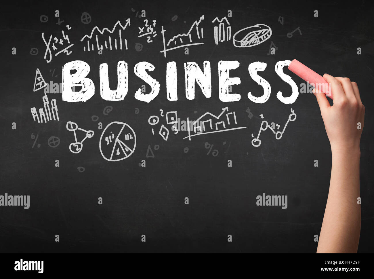 Hand writing business on blackboard Stock Photo - Alamy