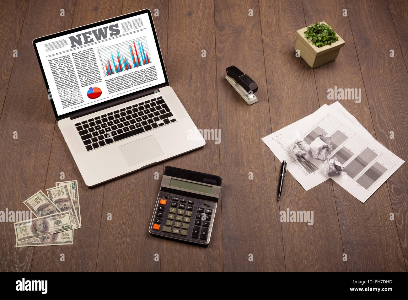 Computer laptop on desk with office accessories Stock Photo - Alamy