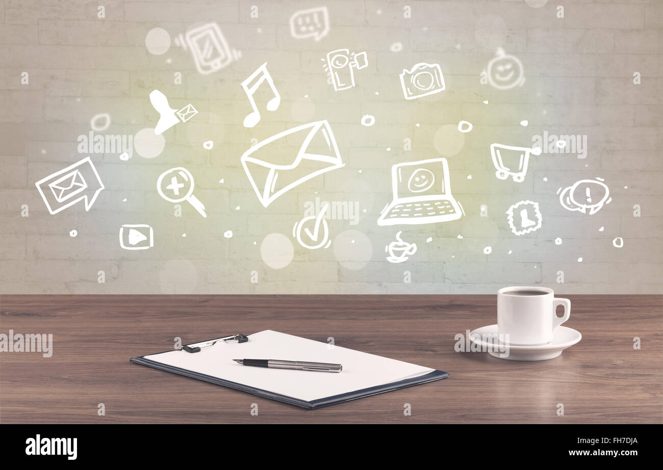 Office desk with communication icons Stock Photo - Alamy