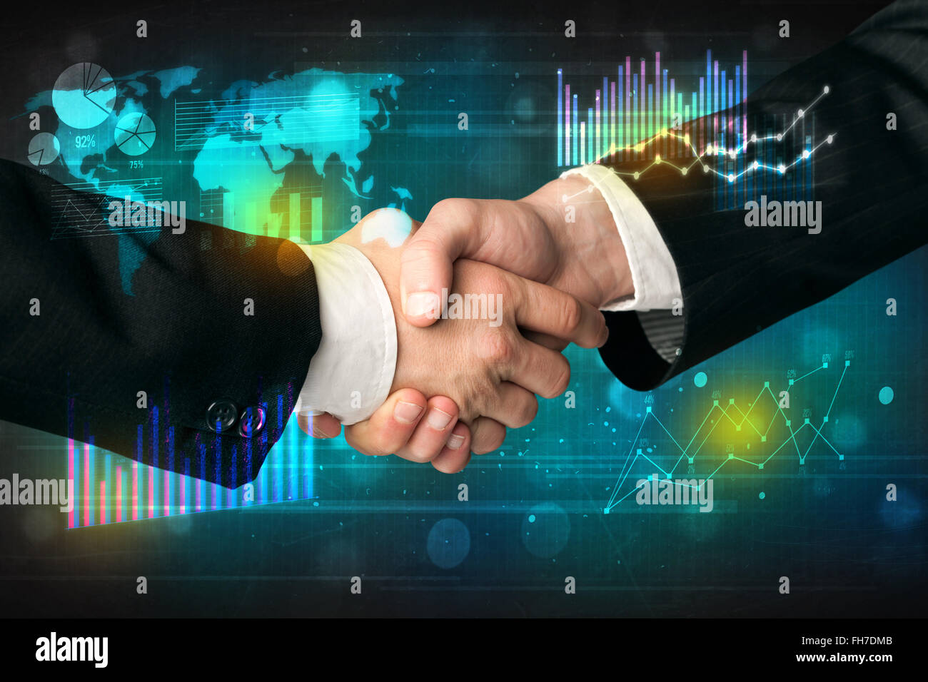 Handshake with diagrams Stock Photo - Alamy