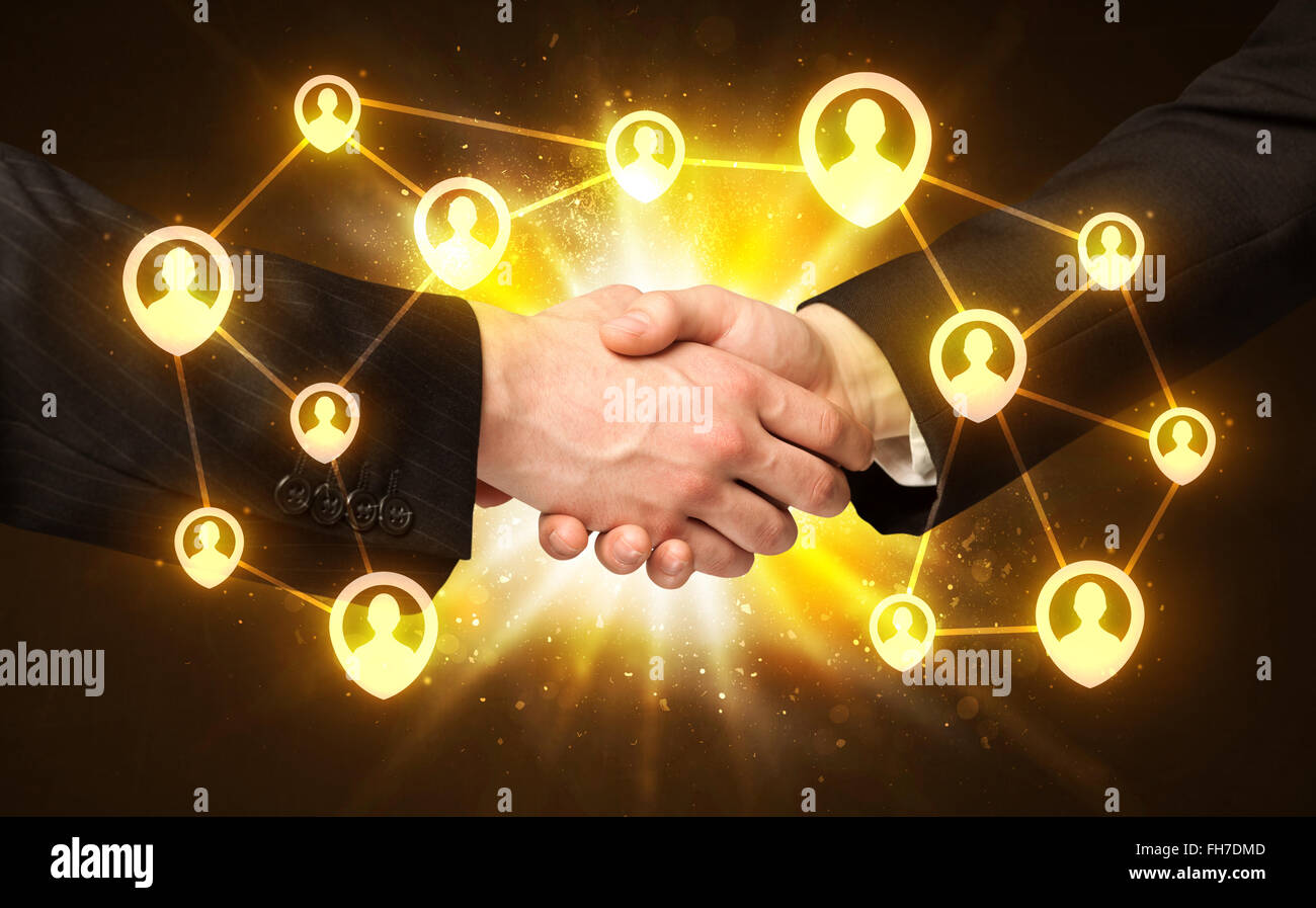 Social netwok connection handshake Stock Photo - Alamy