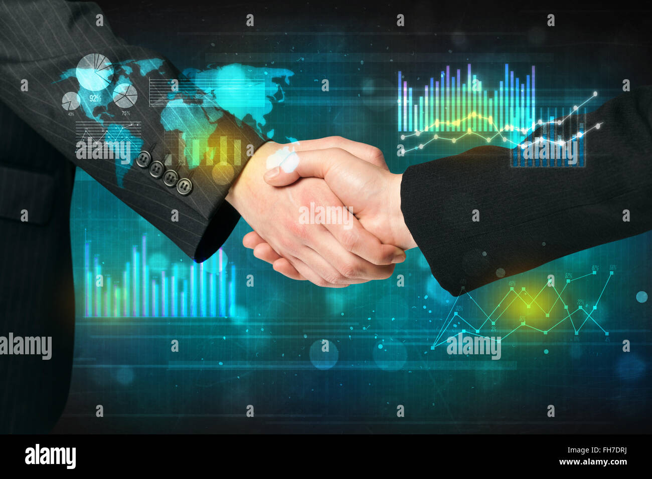Handshake with diagrams Stock Photo - Alamy
