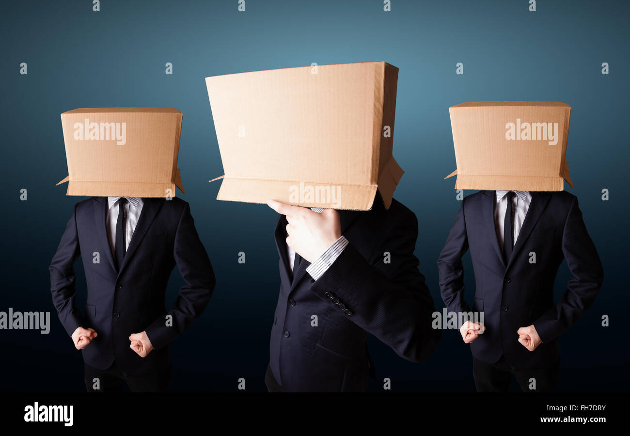 People gesturing with empty box on their head Stock Photo - Alamy
