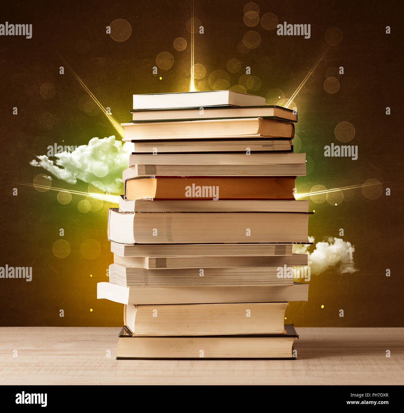 Magical books with ray of magical lights and colorful clouds Stock ...