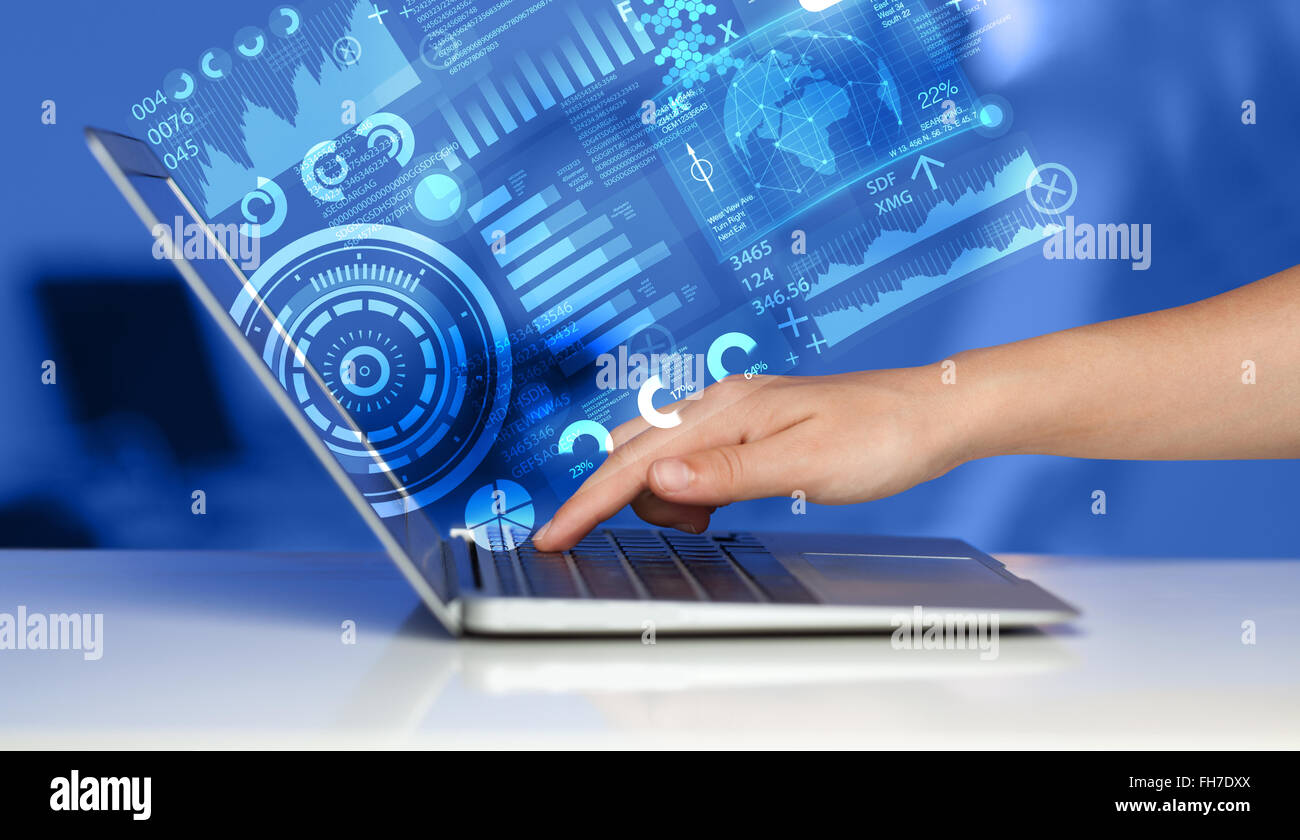 Modern notebook computer with future technology symbols Stock Photo - Alamy