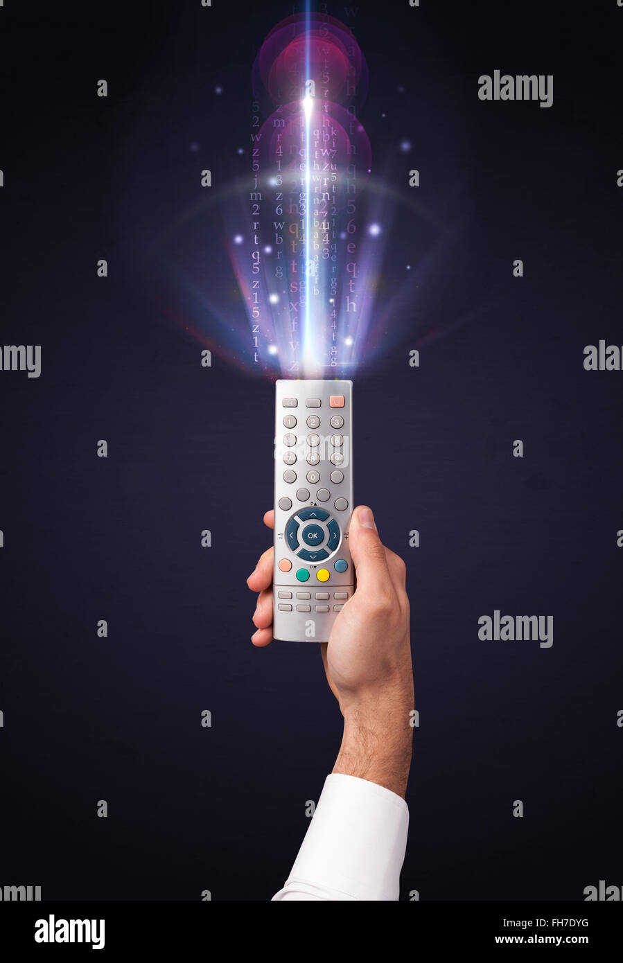 Hand with remote control and shining numbers Stock Photo - Alamy