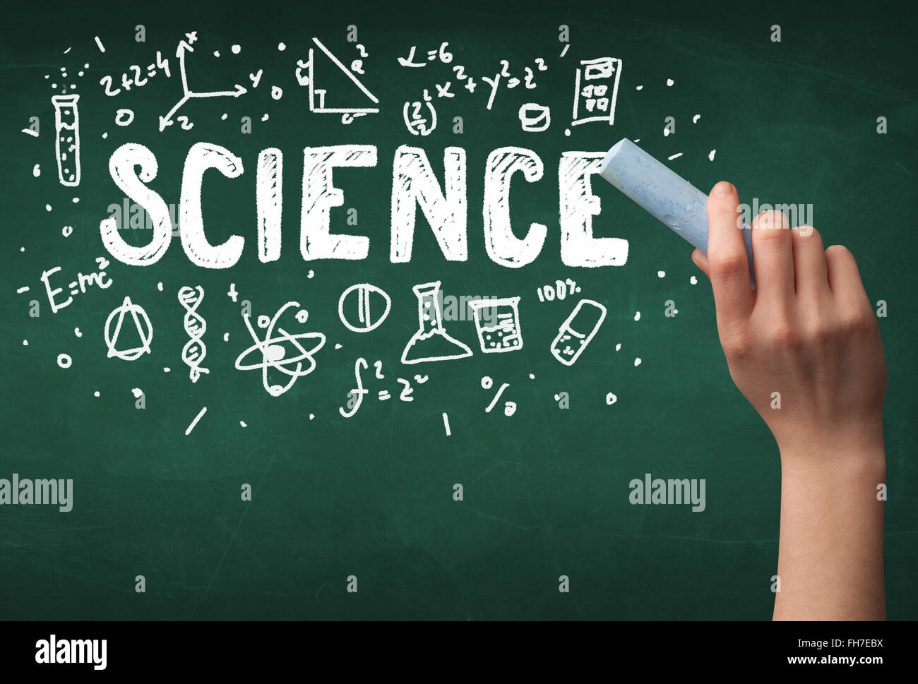 Mature science person drawing on board Stock Photo - Alamy