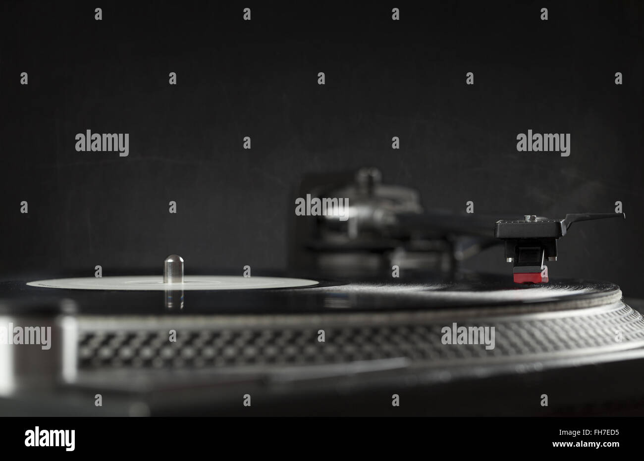 Turntable playing vinyl close up with needle on the record Stock Photo ...
