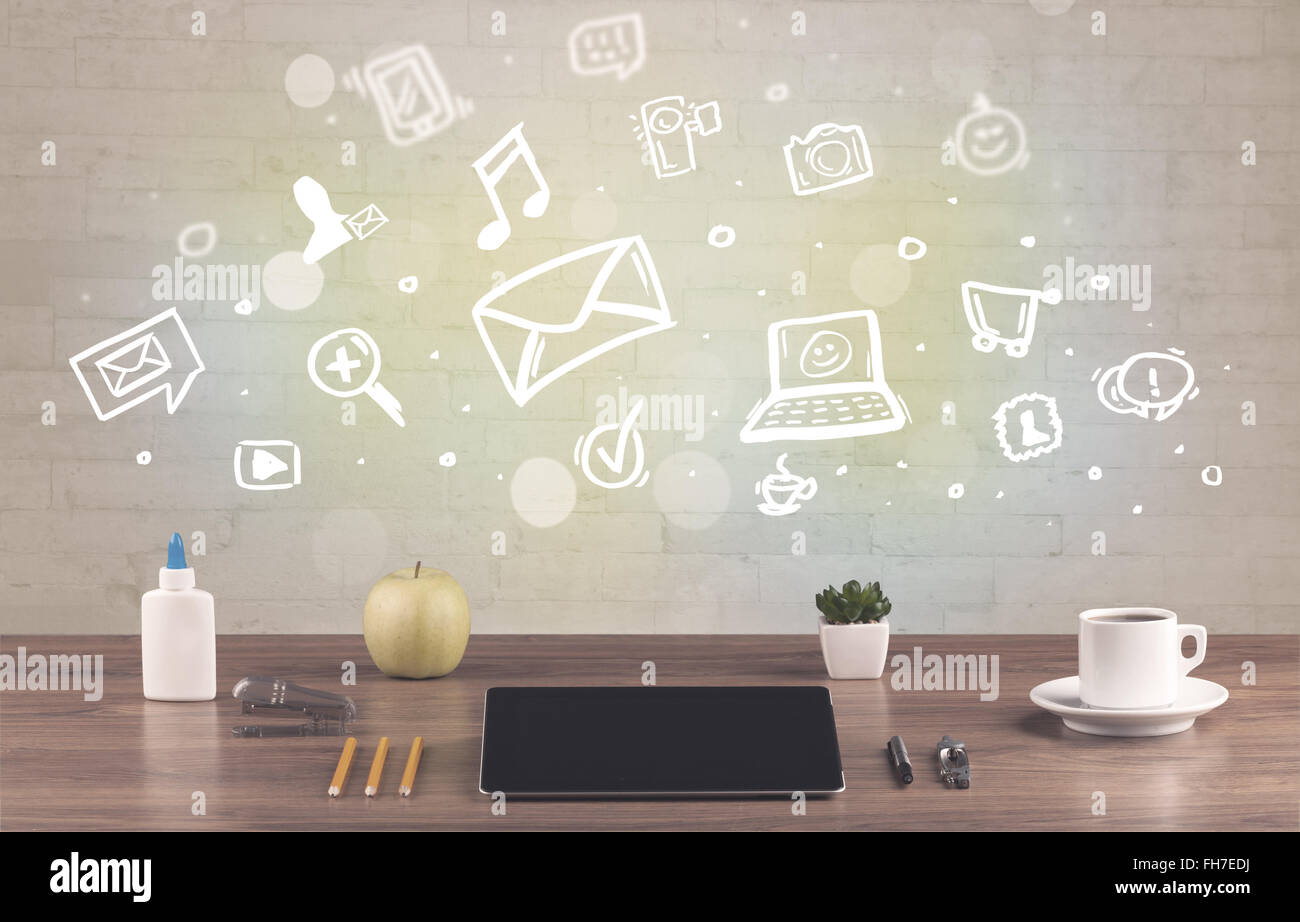 Office desk with communication icons Stock Photo - Alamy
