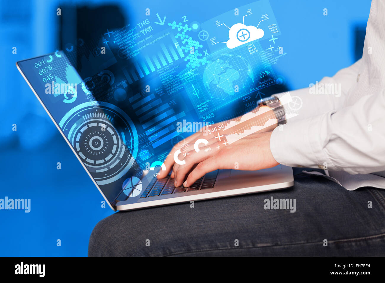 Modern notebook computer with future technology symbols Stock Photo - Alamy