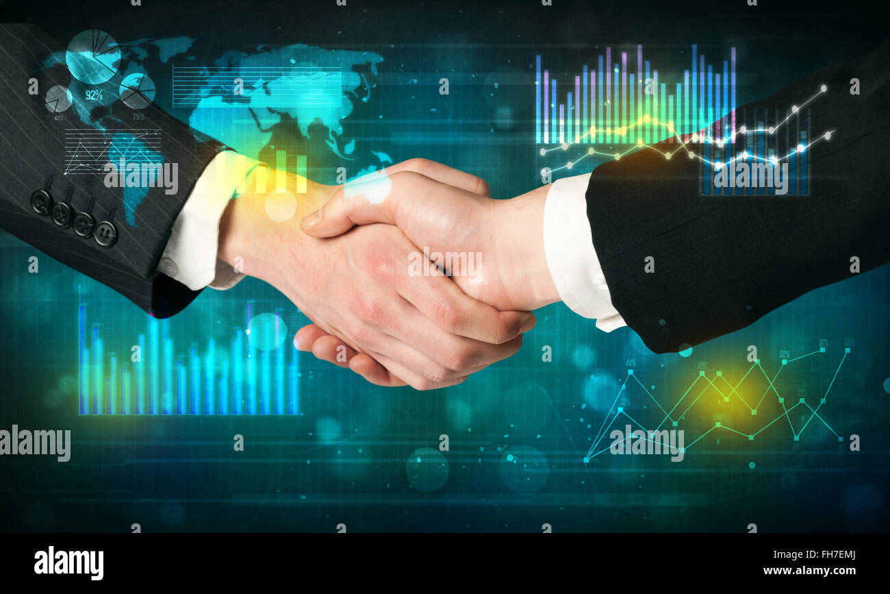 Handshake with diagrams Stock Photo - Alamy
