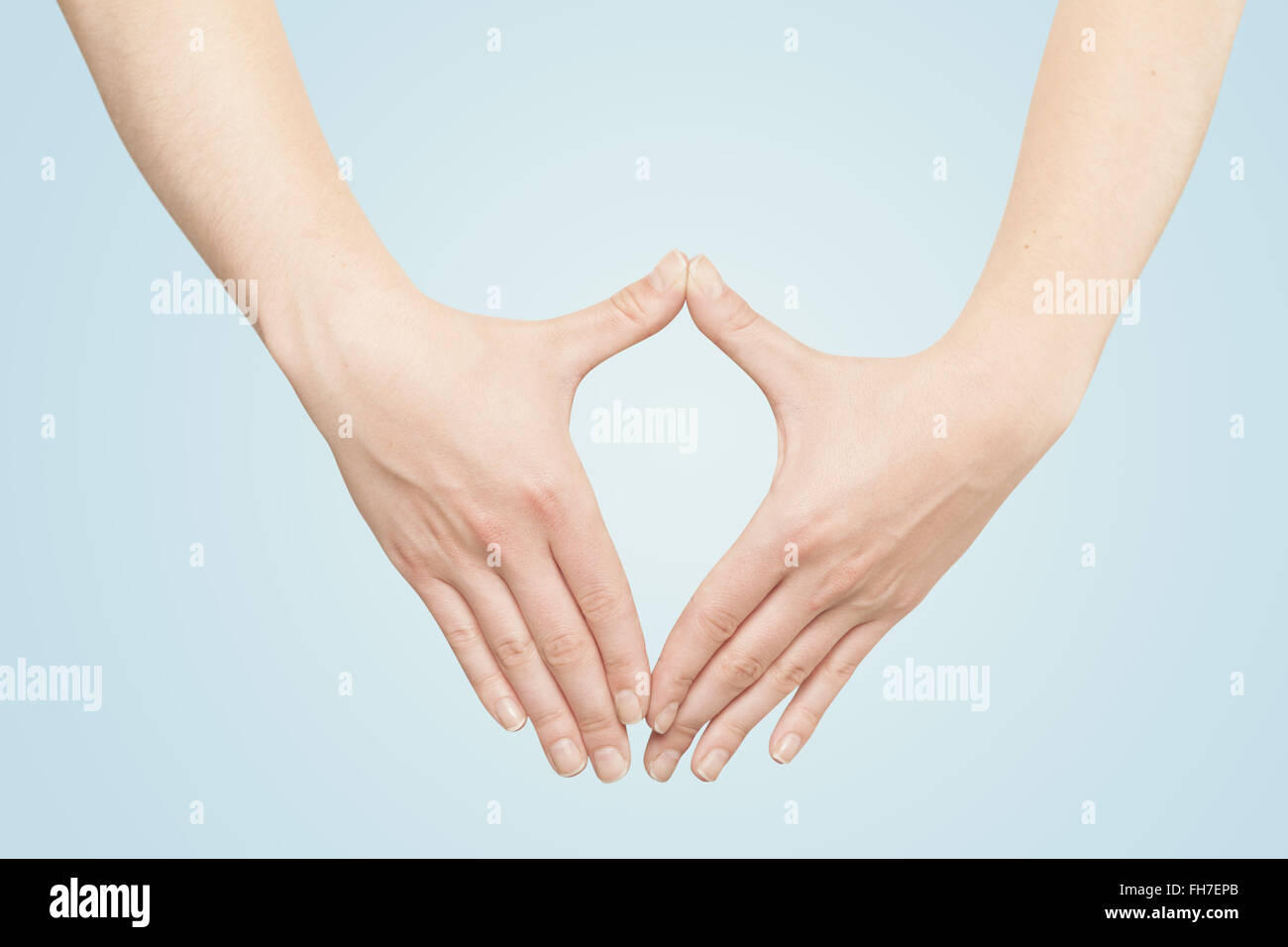 Hands creating form Stock Photo - Alamy