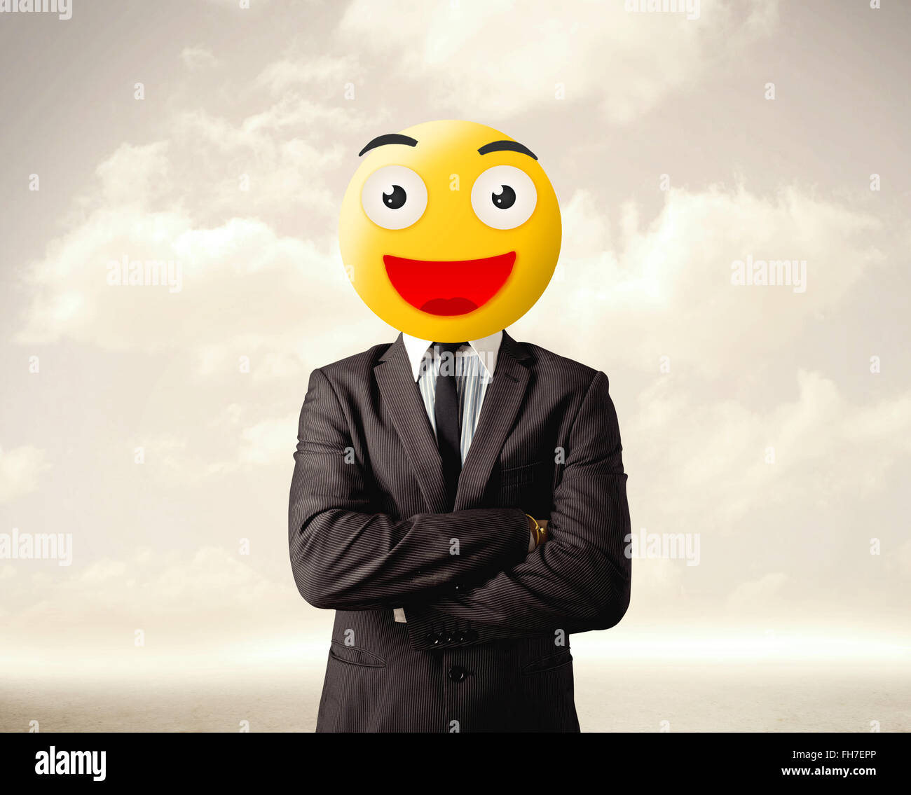 businessman wears yellow smiley face Stock Photo - Alamy