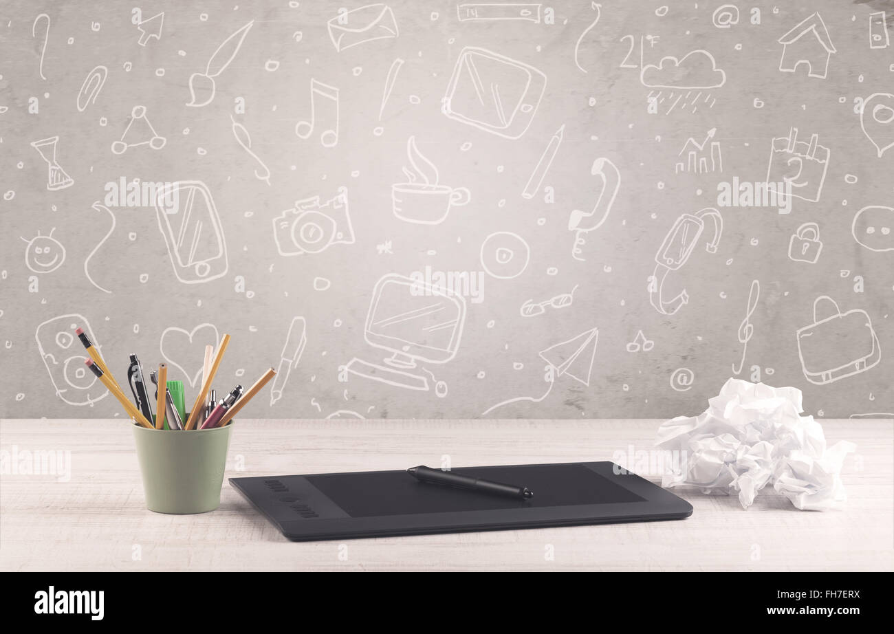 Design office desk with drawings background Stock Photo - Alamy