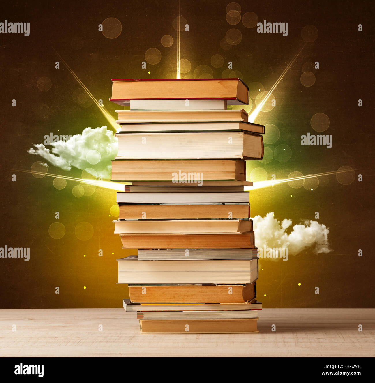 Magical books with ray of magical lights and colorful clouds Stock ...