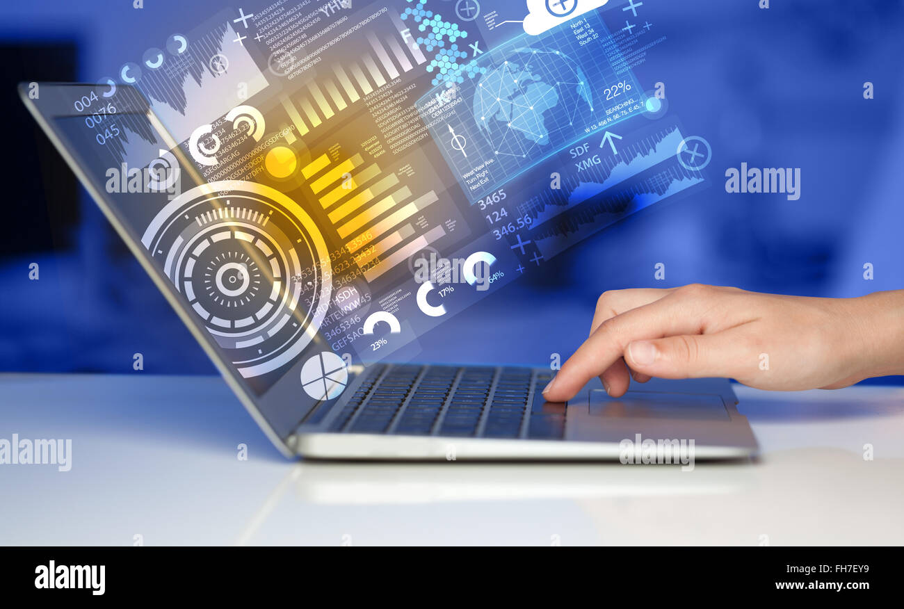 Modern notebook computer with future technology symbols Stock Photo - Alamy